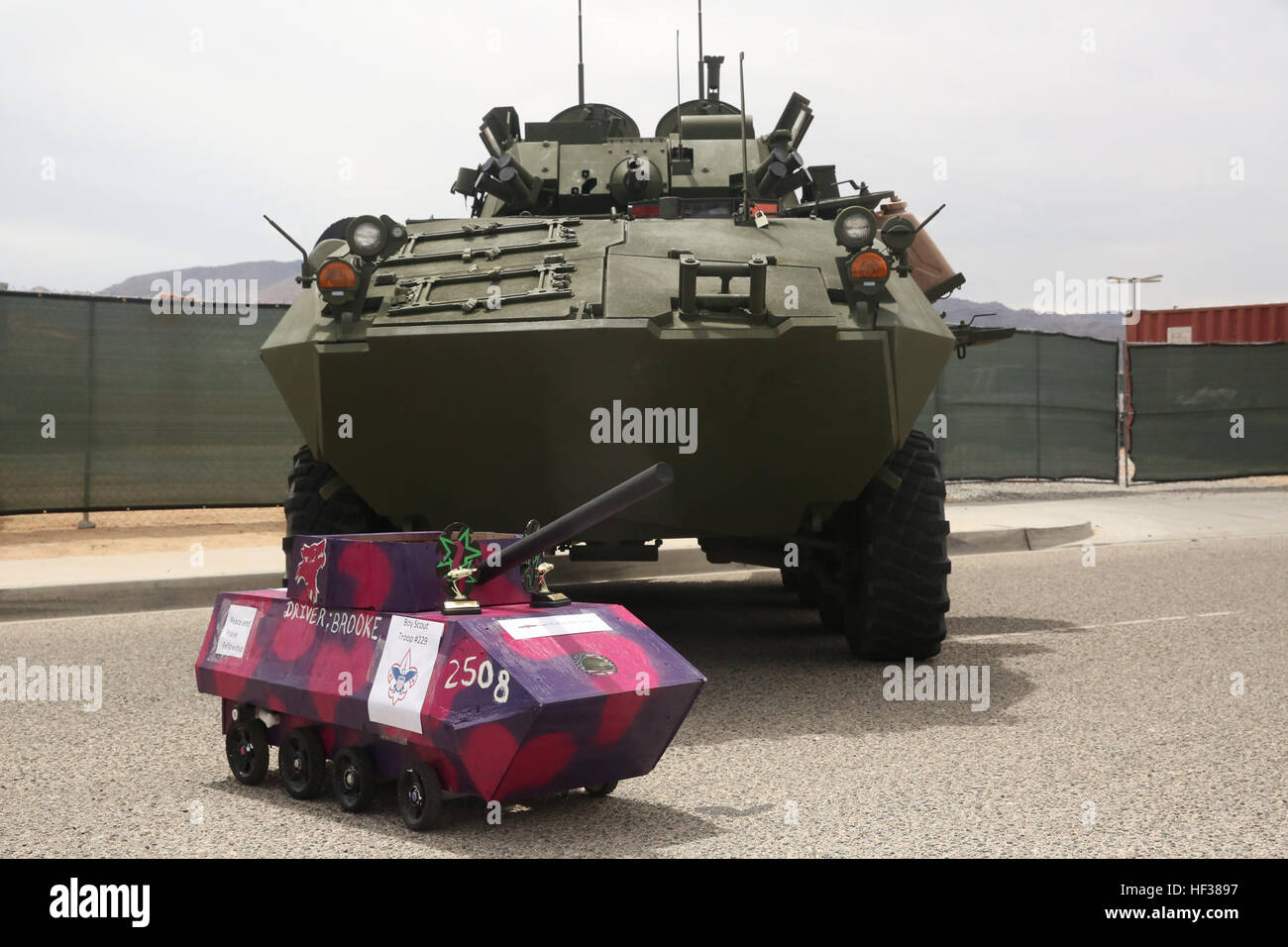 A Light Armored Vehicle static display sits next to a miniature LAV ...