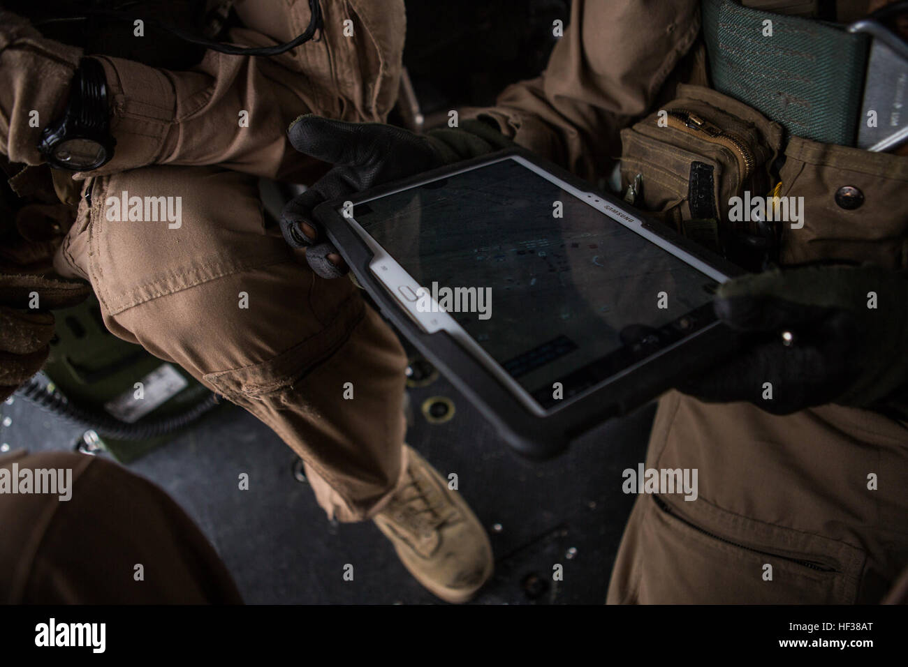 U.S. Marines use a tablet to examine the battlefield for Final Exercise ...