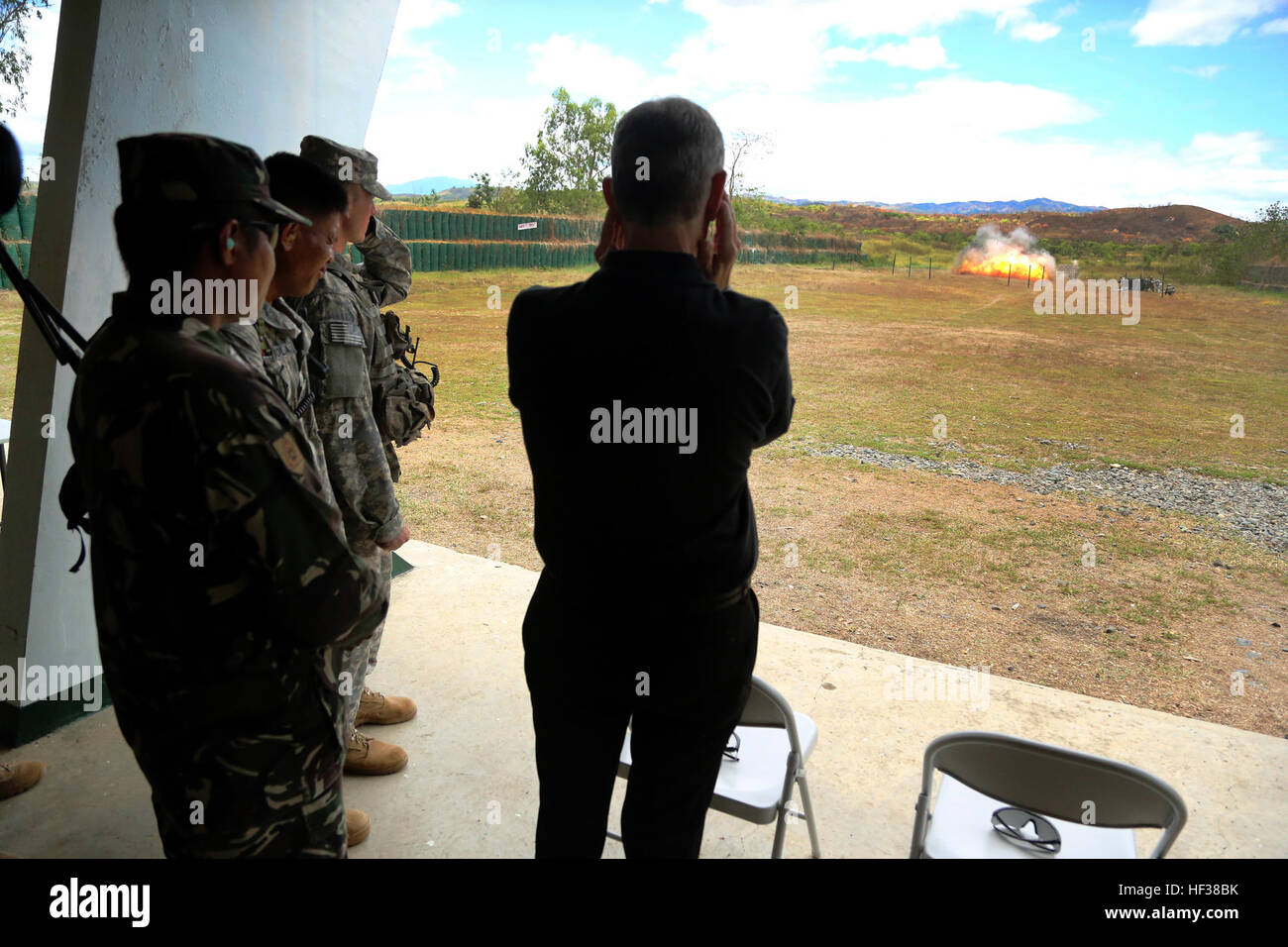 Secretary of the Army John M. McHugh observes a wall breaching charge ...