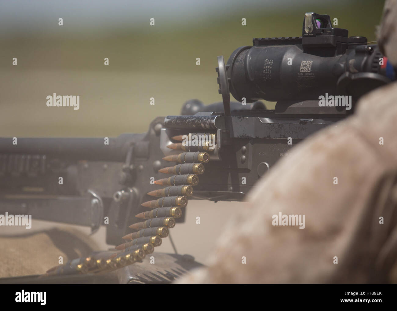 A Marine with Bravo Company, 1st Battalion, 8th Marine Regiment, fires ...