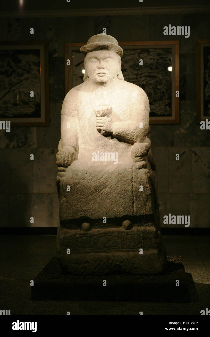 A sculpture of Chinggis Khan stands inside the National Museum of ...