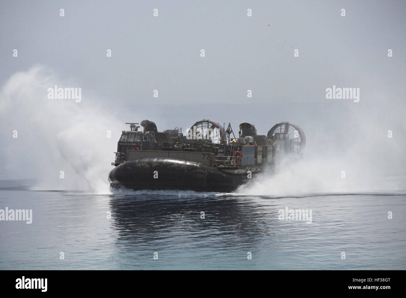 A U.S. Navy landing craft, air cushion hovercraft transports Marines ...