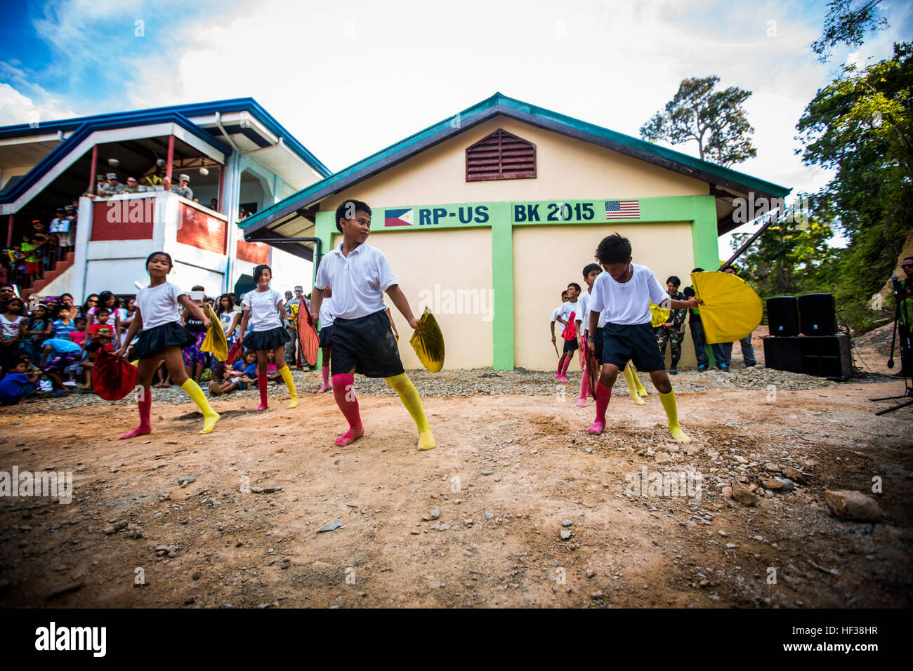 Students of the Sabang Elementary School perform a dance before the ...