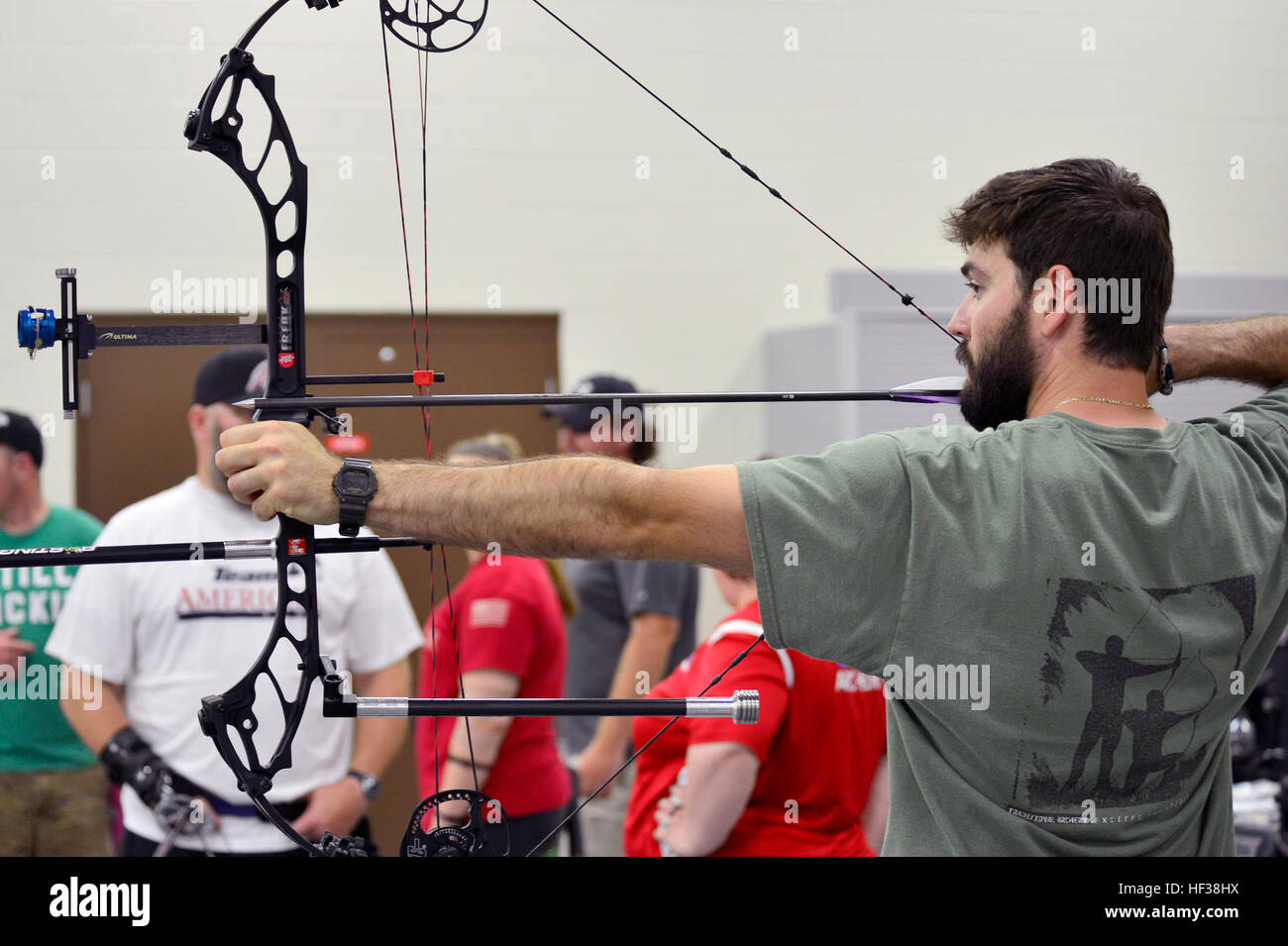 Army Sgt. Mirko Brdar hones his archery techniques with the rest of the ...