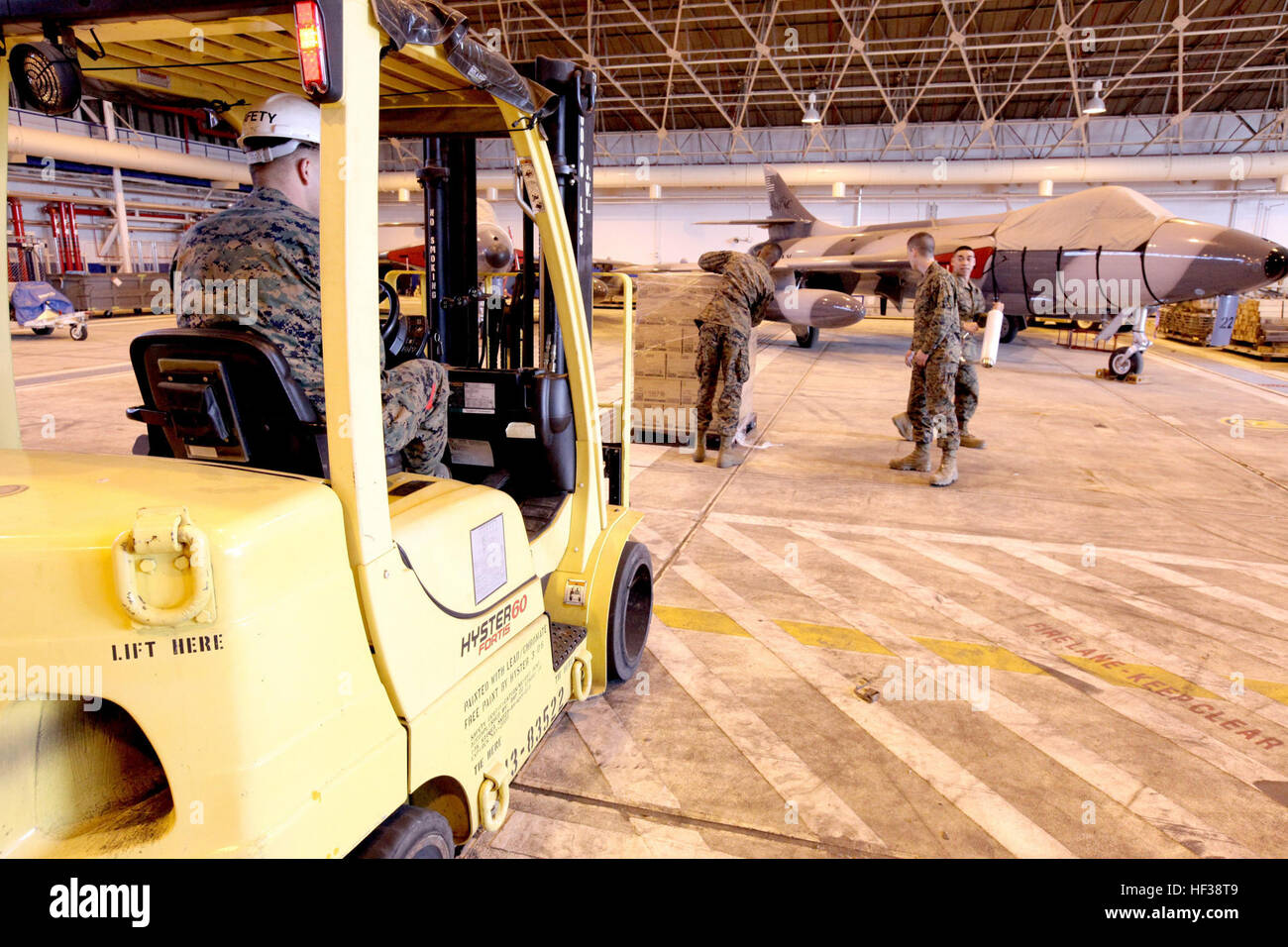 Marines attached to the Arrival/Departure Airfield Control Group here ...