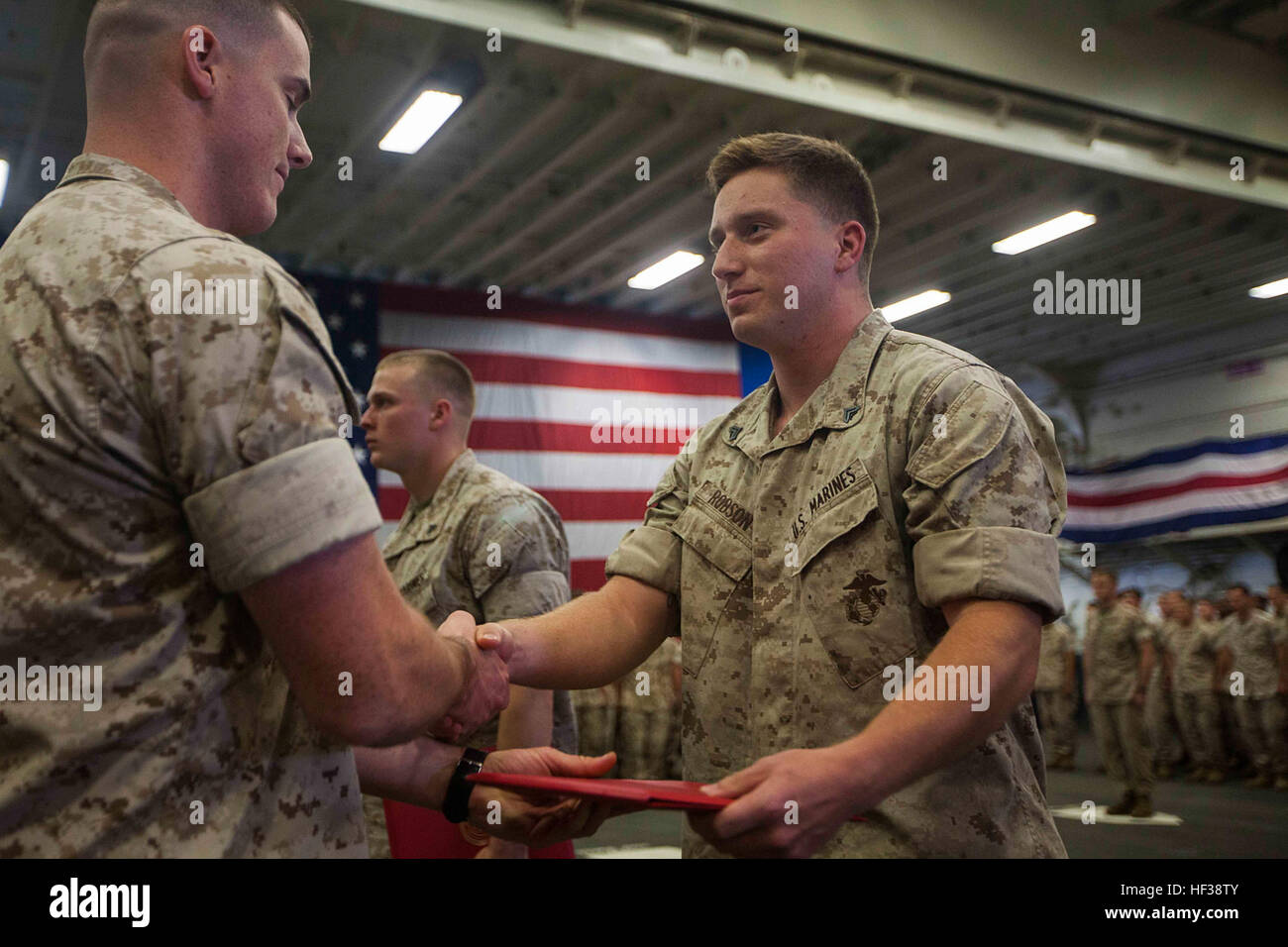 U.S. Marine Corps Cpl. Jesse Robson, right, tank crewman with the 22nd ...