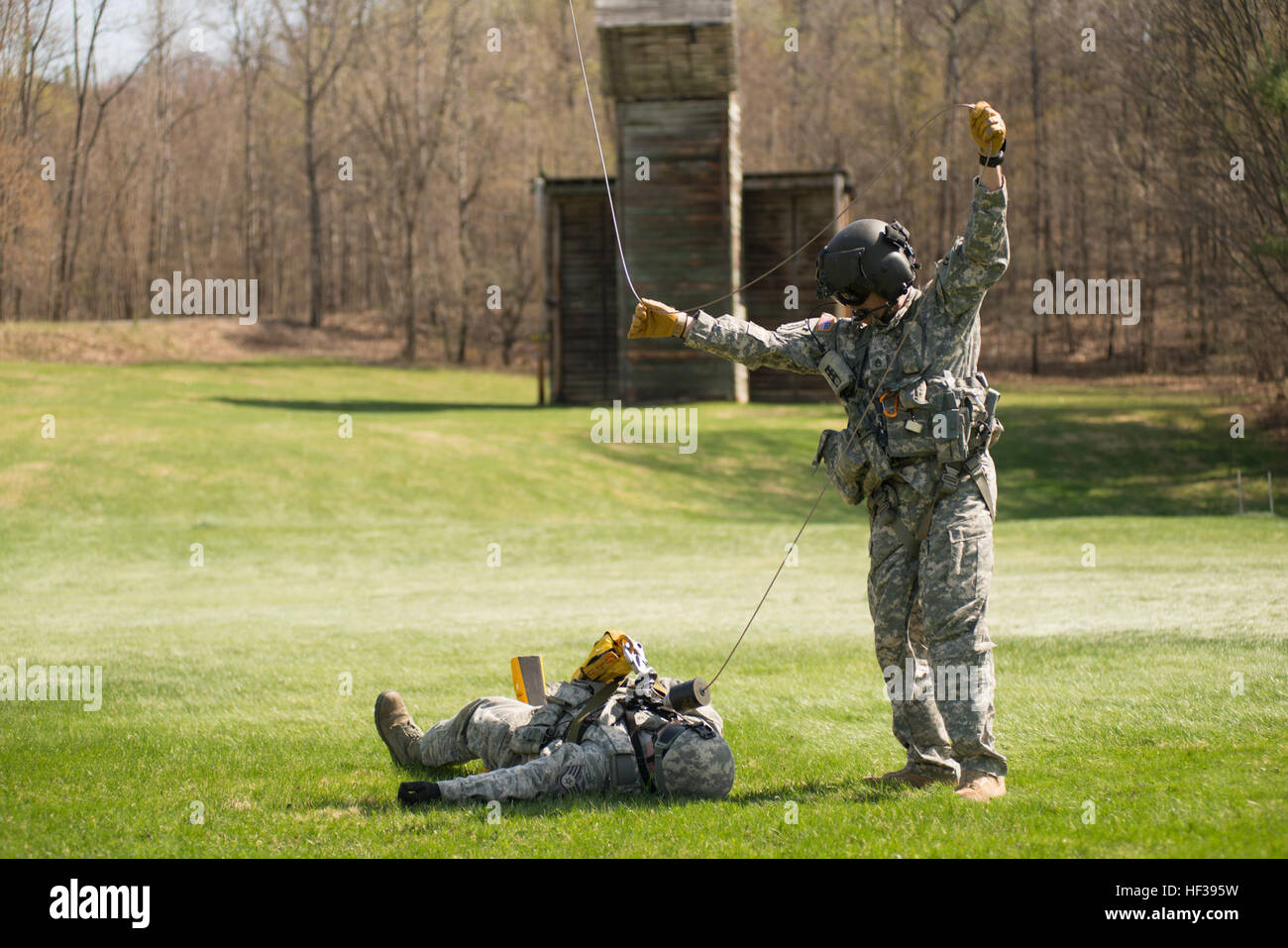 U.S. Army Soldier Staff Sgt. Stephen Trala, right, from Charlie Company ...