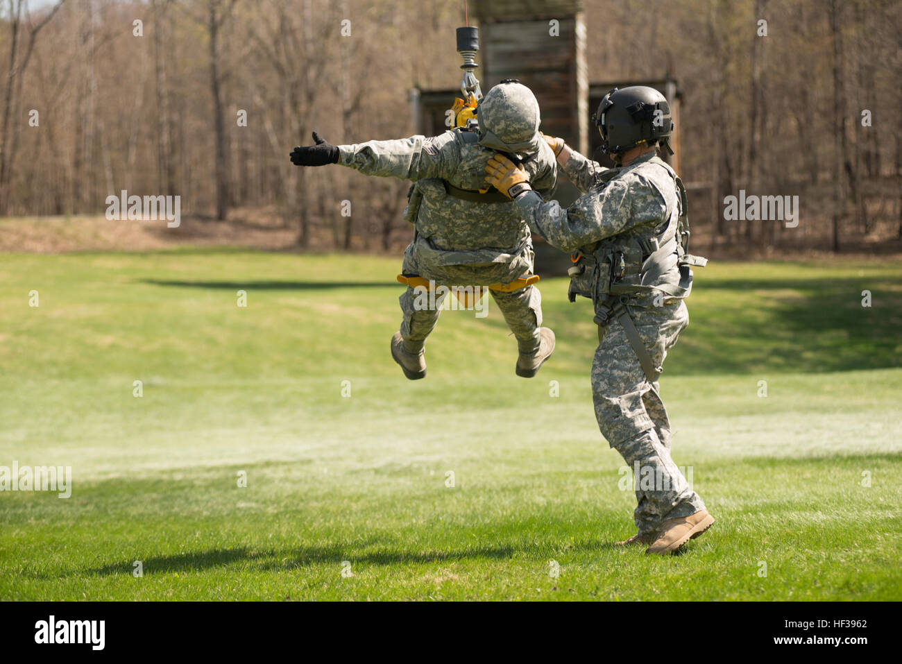 U.S. Army Soldier Staff Sgt. Stephen Trala, right, from Charlie Company ...