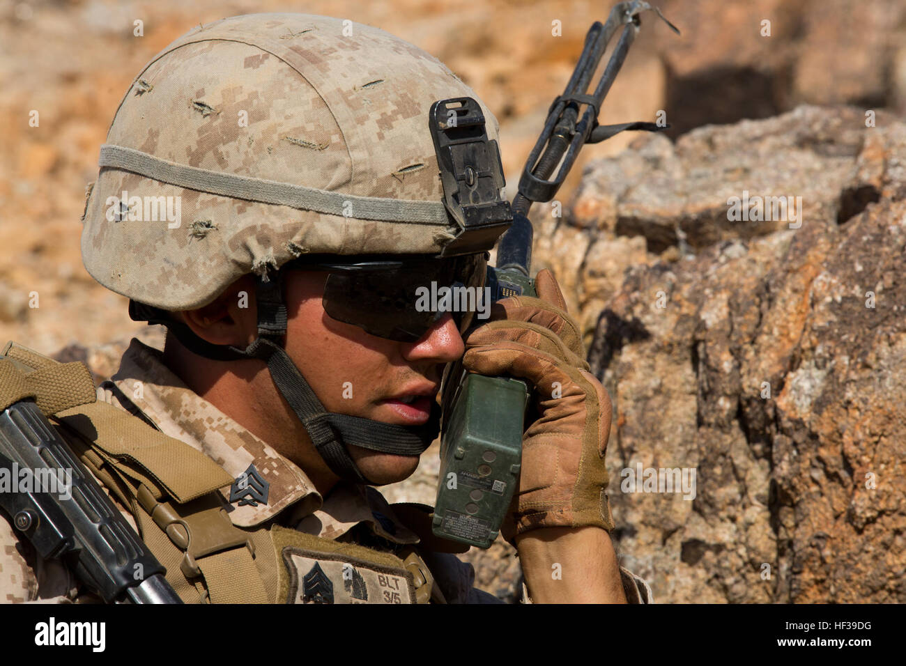 A U.S. Marine with Kilo Company, 3rd Battalion, 5th Marines, engages in ...