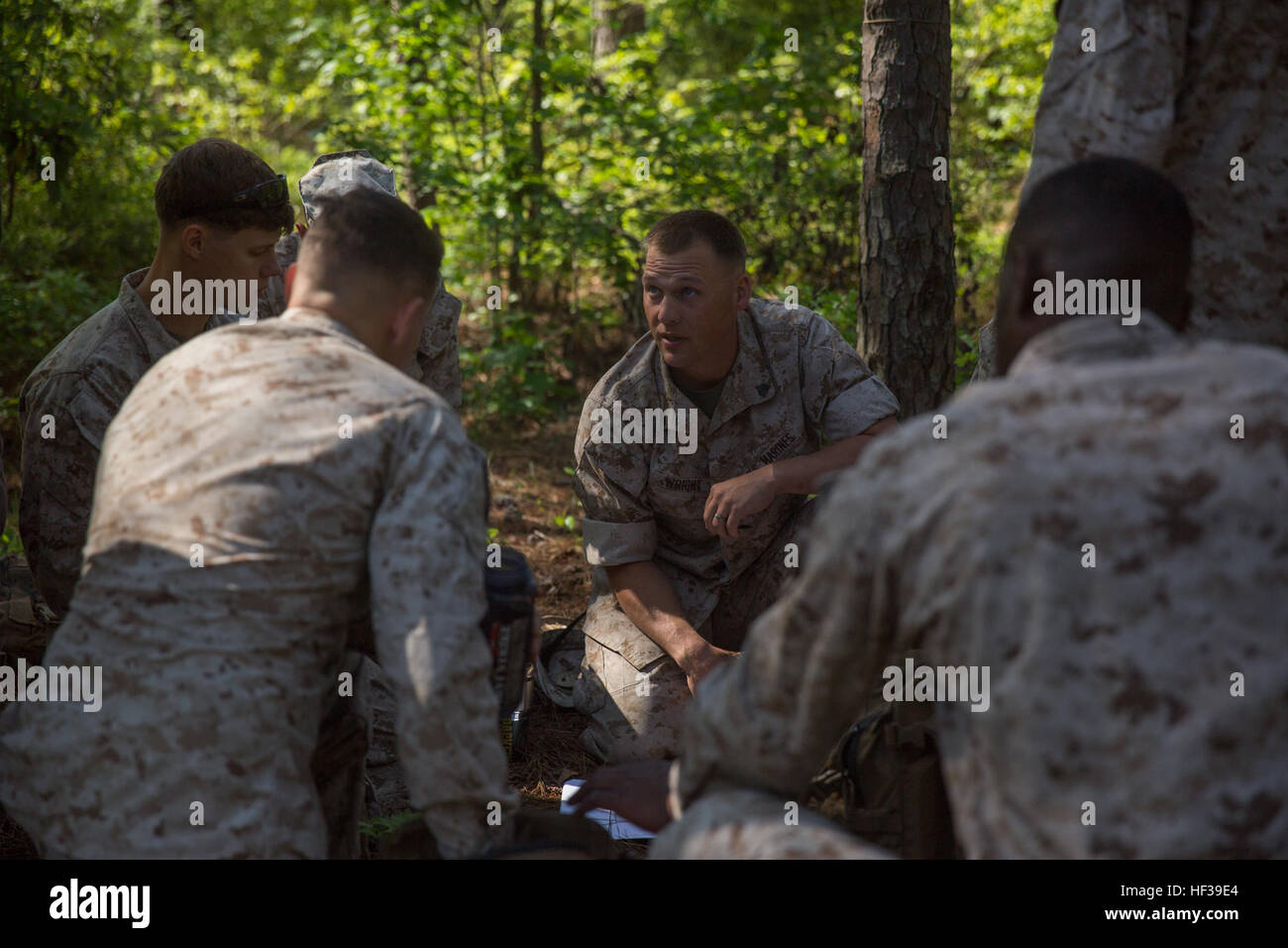 A combat instructor leads Marines through the process of selecting and ...