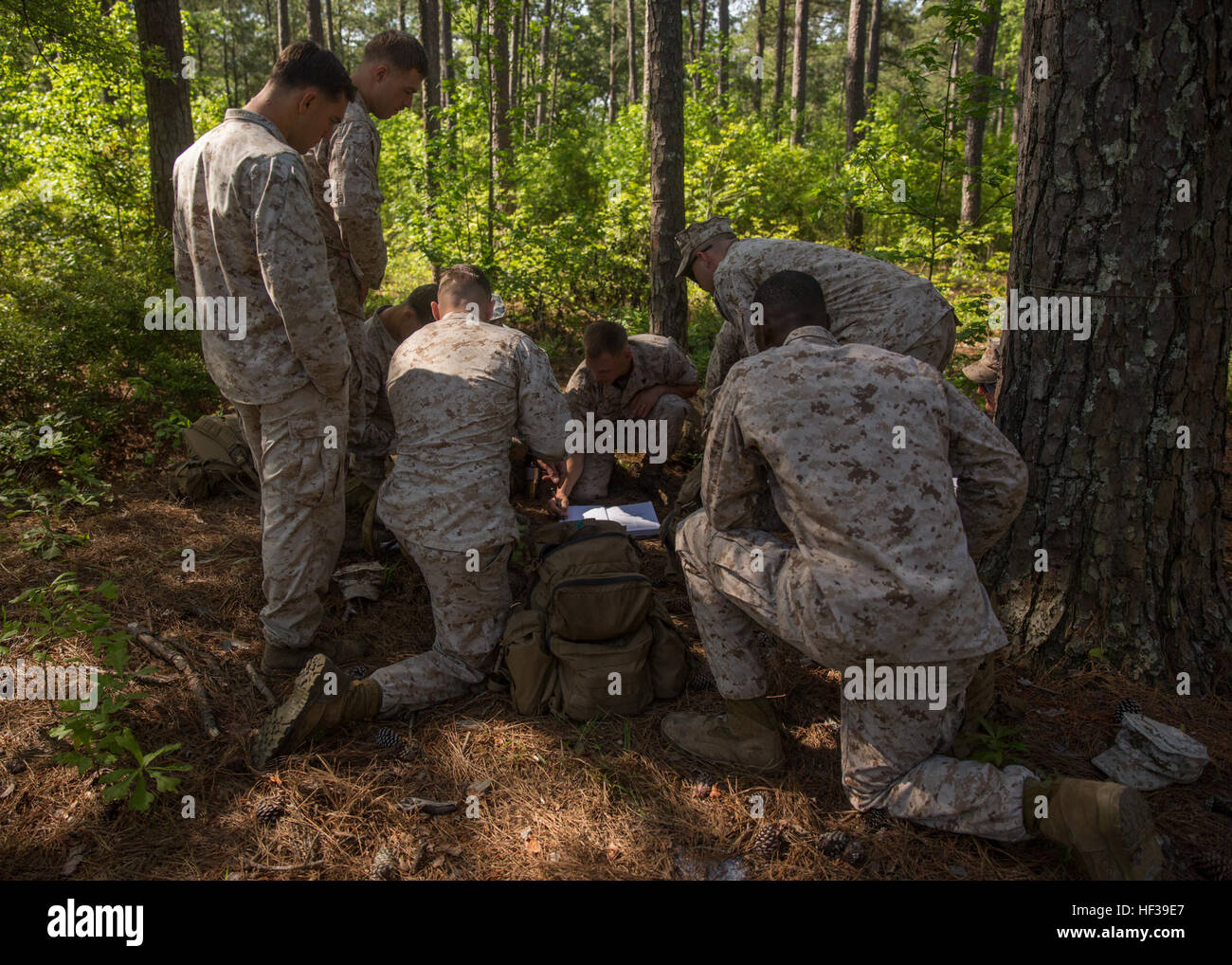 A squad of Marines, all students with the Advanced Machine Gunner ...