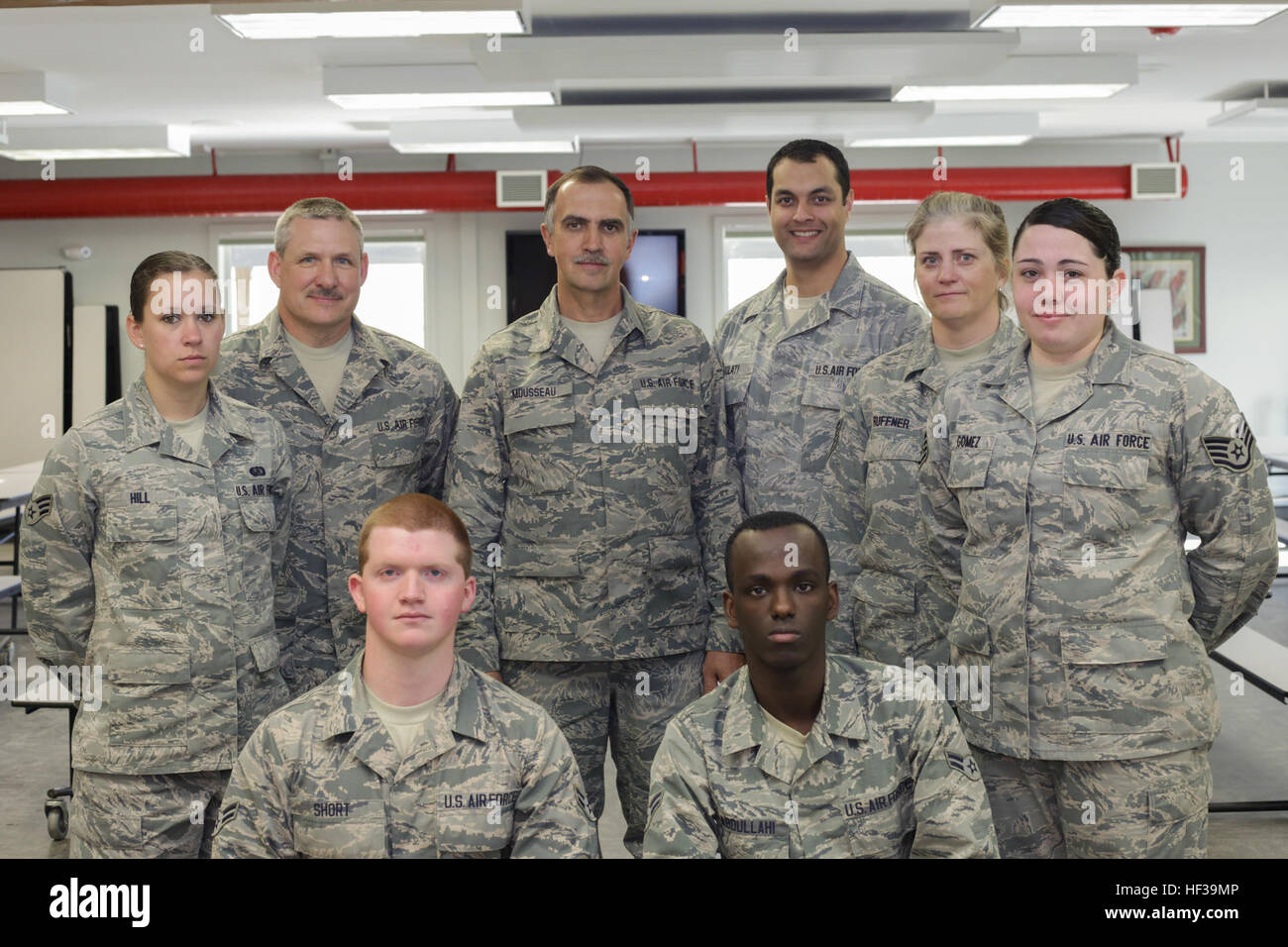 Airmen from the 158th Fighter Wing Services Flight celebrate a ...