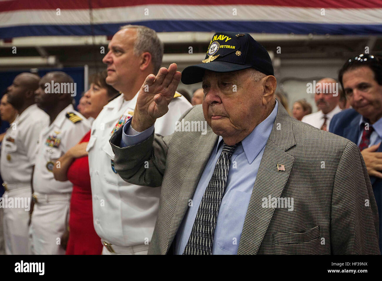 David Epstein, U.S. Navy World War II veteran, salutes during the ...