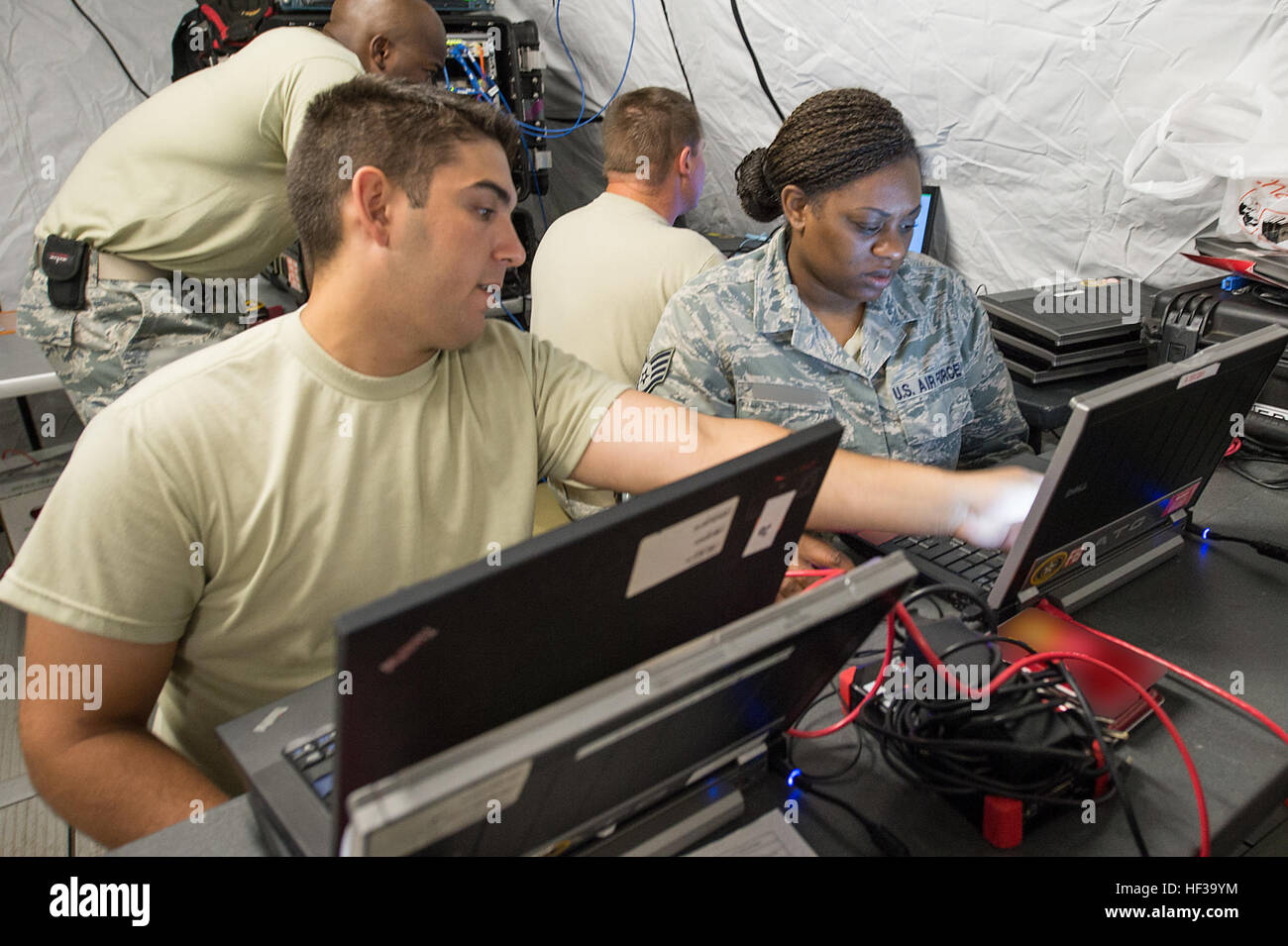 Airmen with the 283rd Combat Communications Squadron (CBCS) from ...