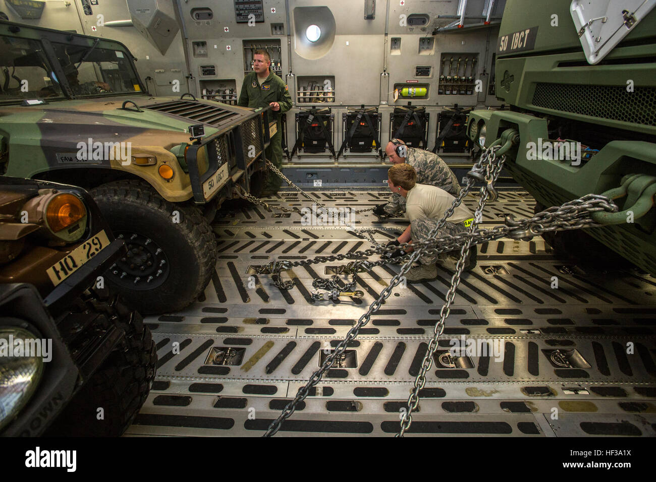 Airman 1st Class Lacy Thompson, kneeling front, 305th Aerial Port ...