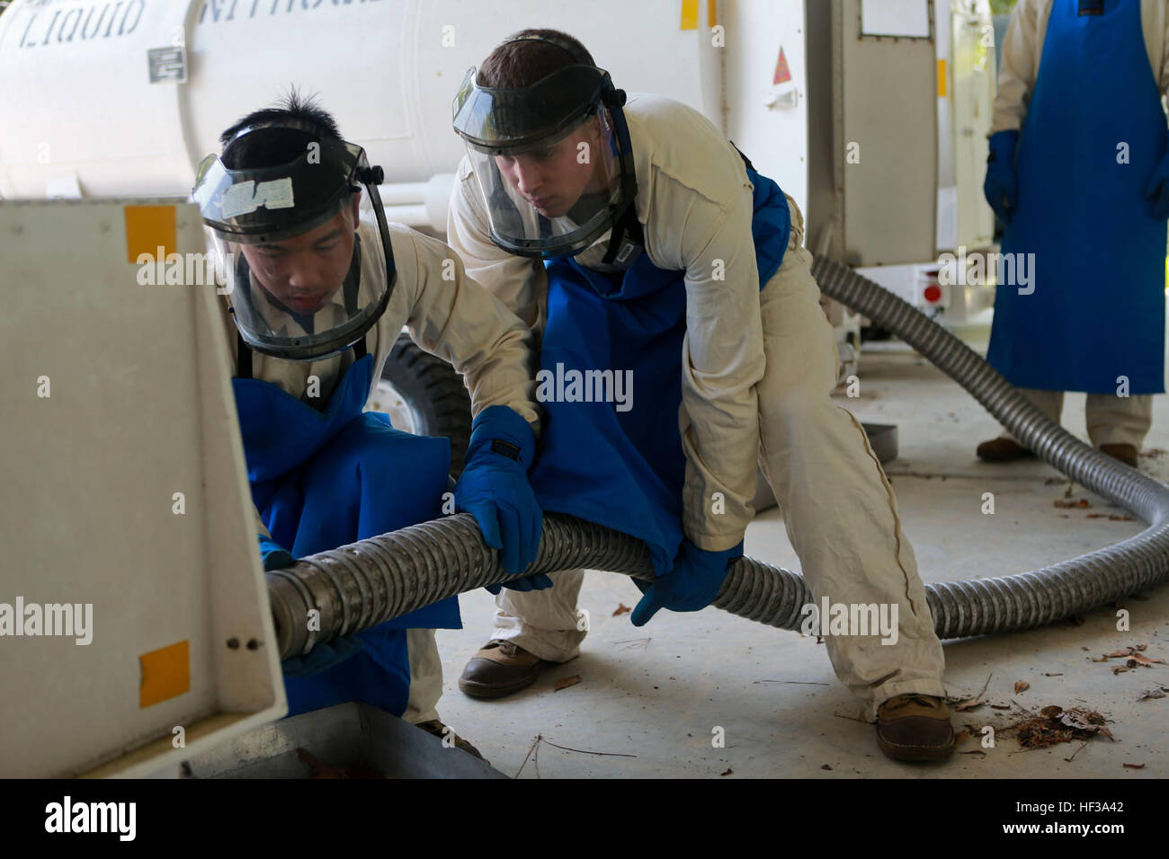 U.S. Marine Corps Lance Cpl. Jonathan Liang, left, and Pfc. Taylor A ...
