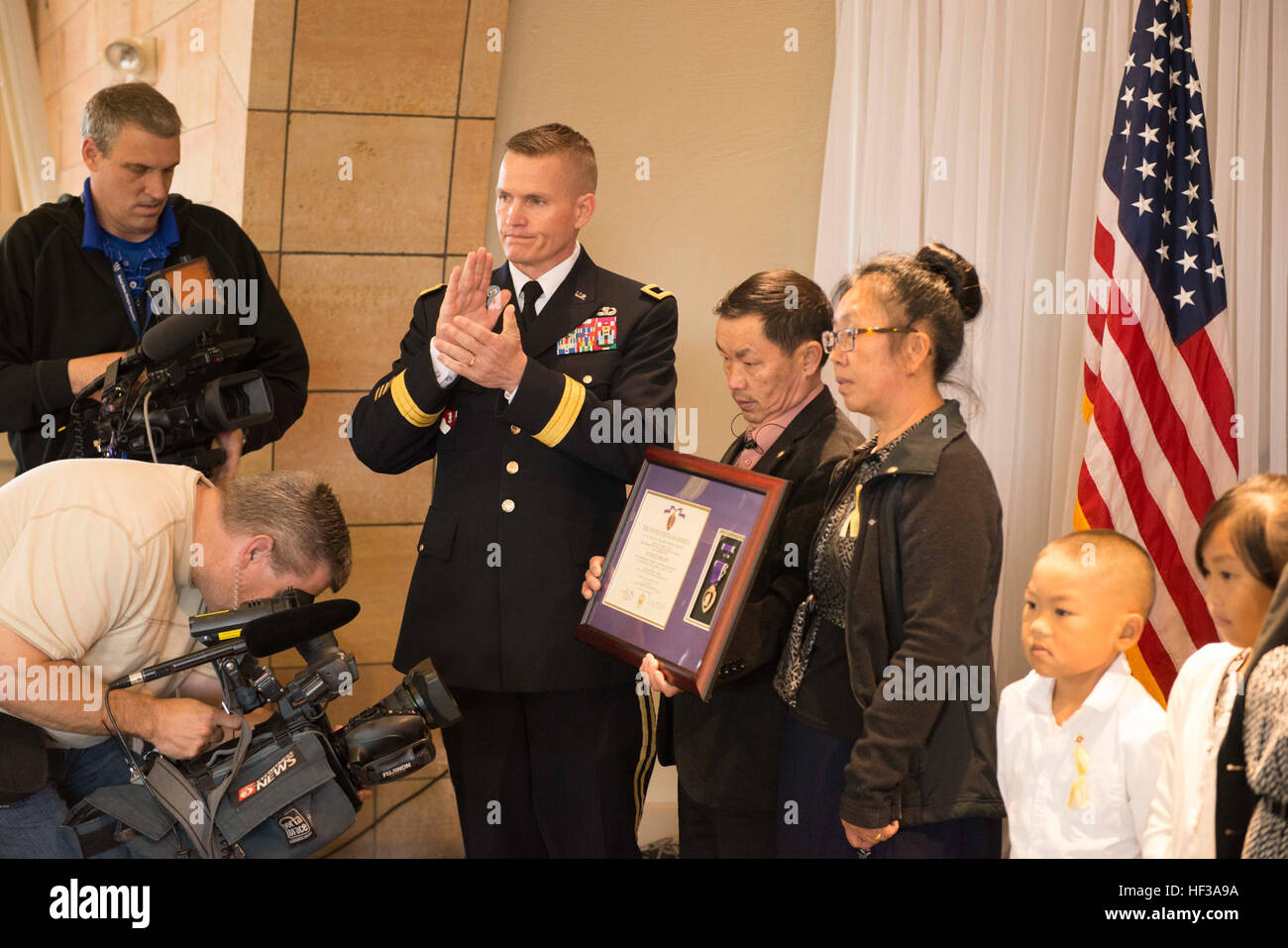 Brig. Gen. Kent Savre, Fort Leonard Wood commanding general, presents ...