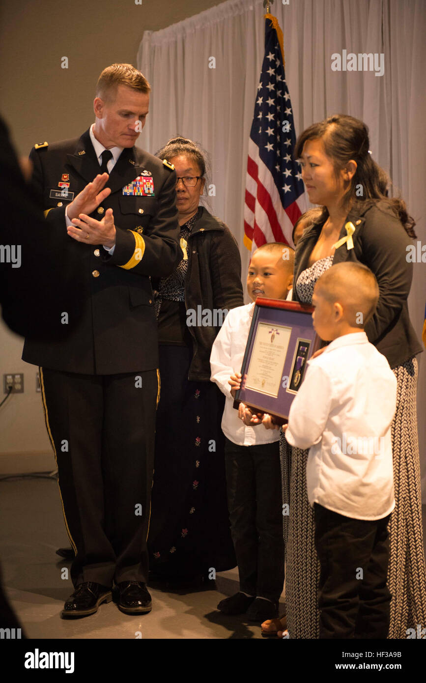 Brig. Gen. Kent Savre, Fort Leonard Wood commanding general, presents ...