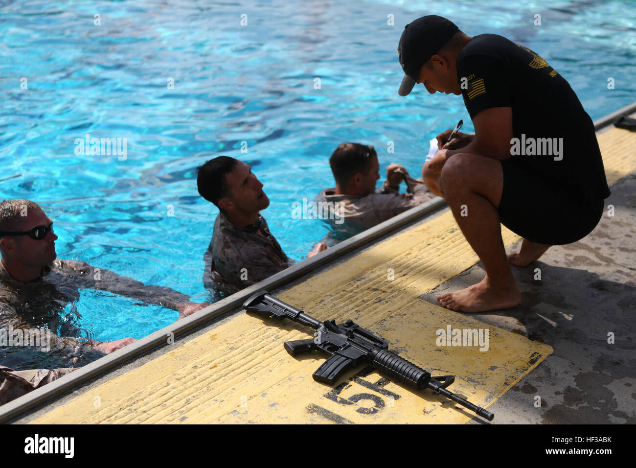 A Marine checks in during one of the two aquatic events during the 7th ...