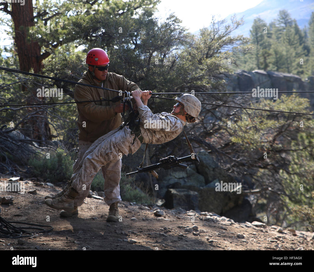Staff Sgt. Raphael Palisoc, mountain leader, secures Sgt. Rebecca ...