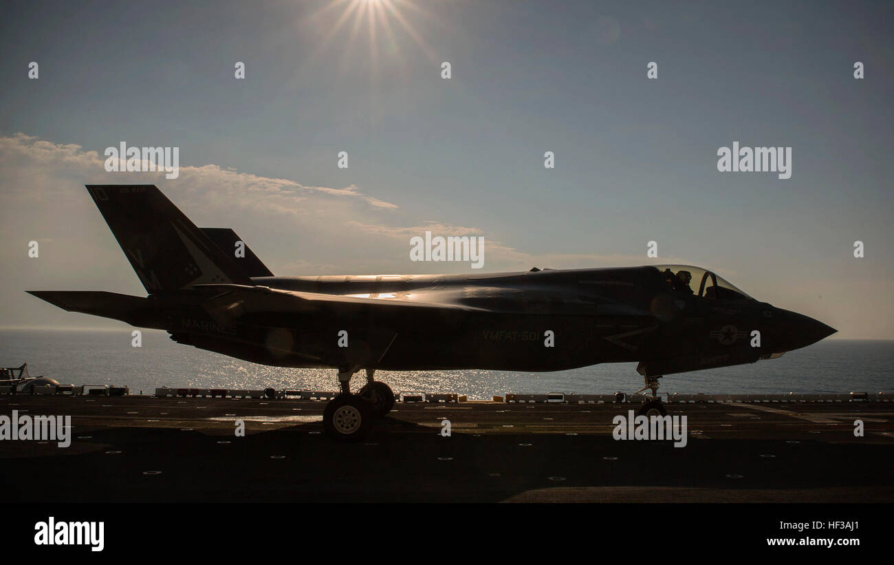 An F-35B Lightning II Joint Strike Fighter idles on the flight deck of ...