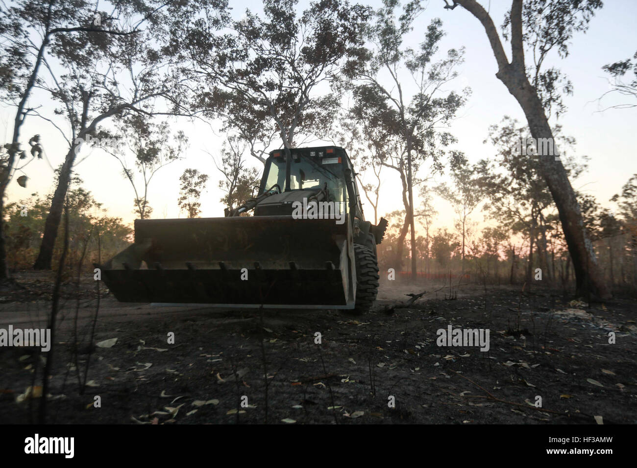 Marines with Marine Rotational Force – Darwin operate a loader-backhoe ...