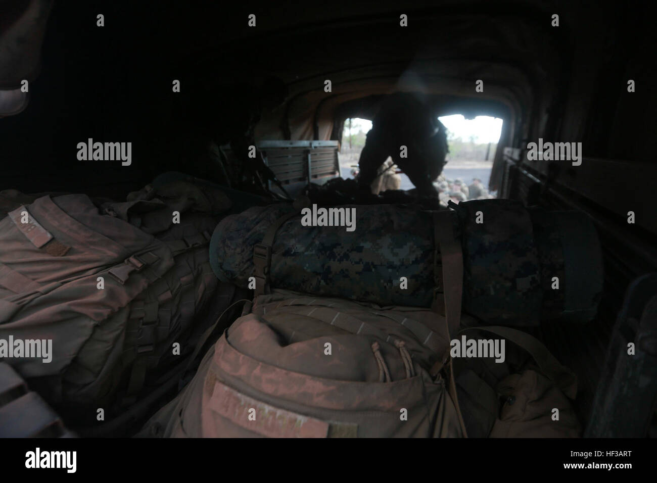 U.S. Marines with Marine Rotational Force – Darwin load packs onto a ...