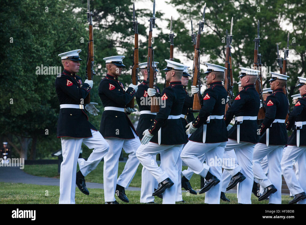 The U.S. Marine Corps Silent Drill Platoon performs during the sunset ...