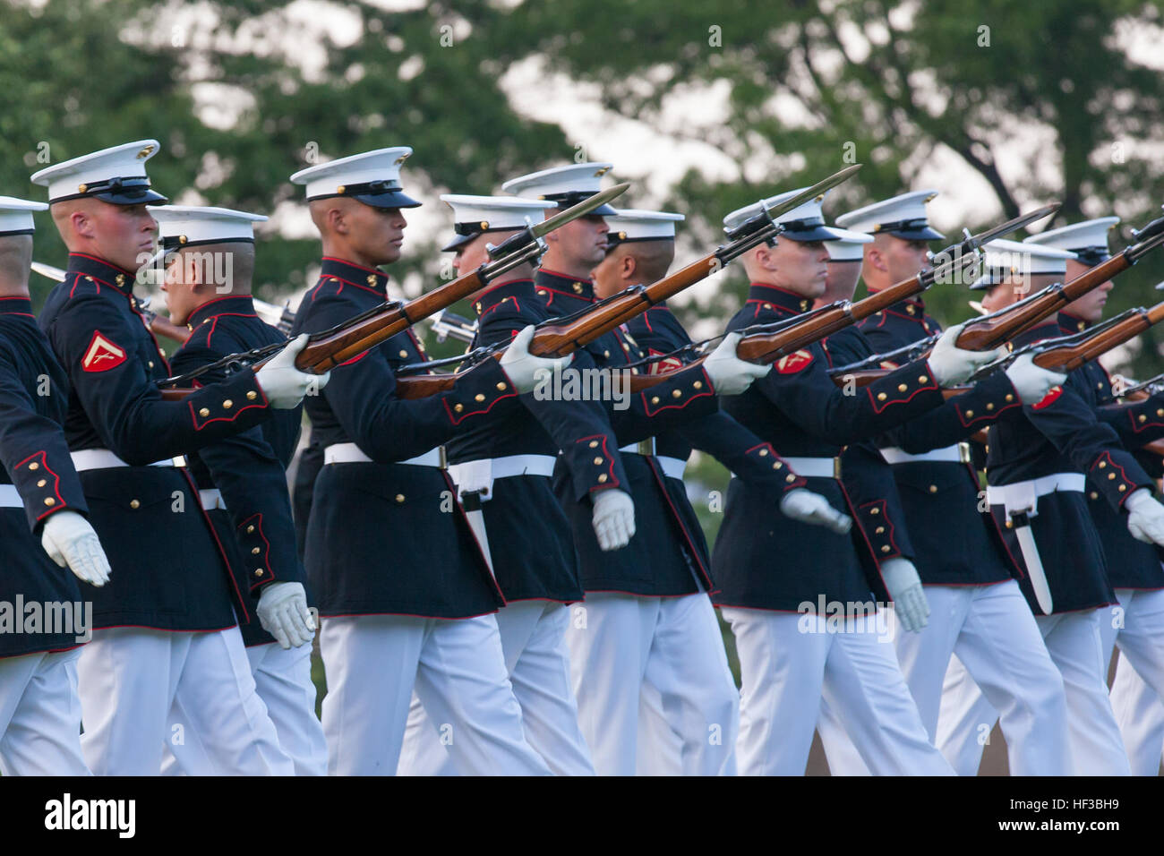 The U.S. Marine Corps Silent Drill Platoon performs during the sunset ...