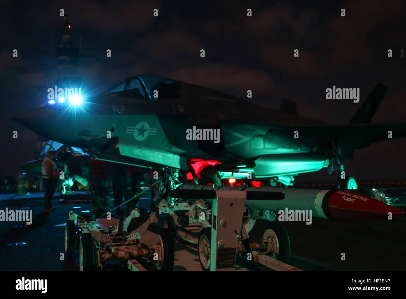 Marines load ordnance onto an F-35B Lightning II during Operational ...