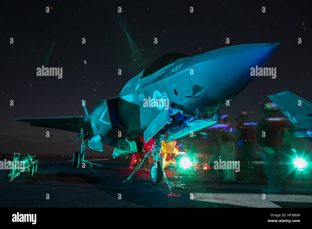 Marines load ordnance onto an F-35B Lightning II during Operational ...