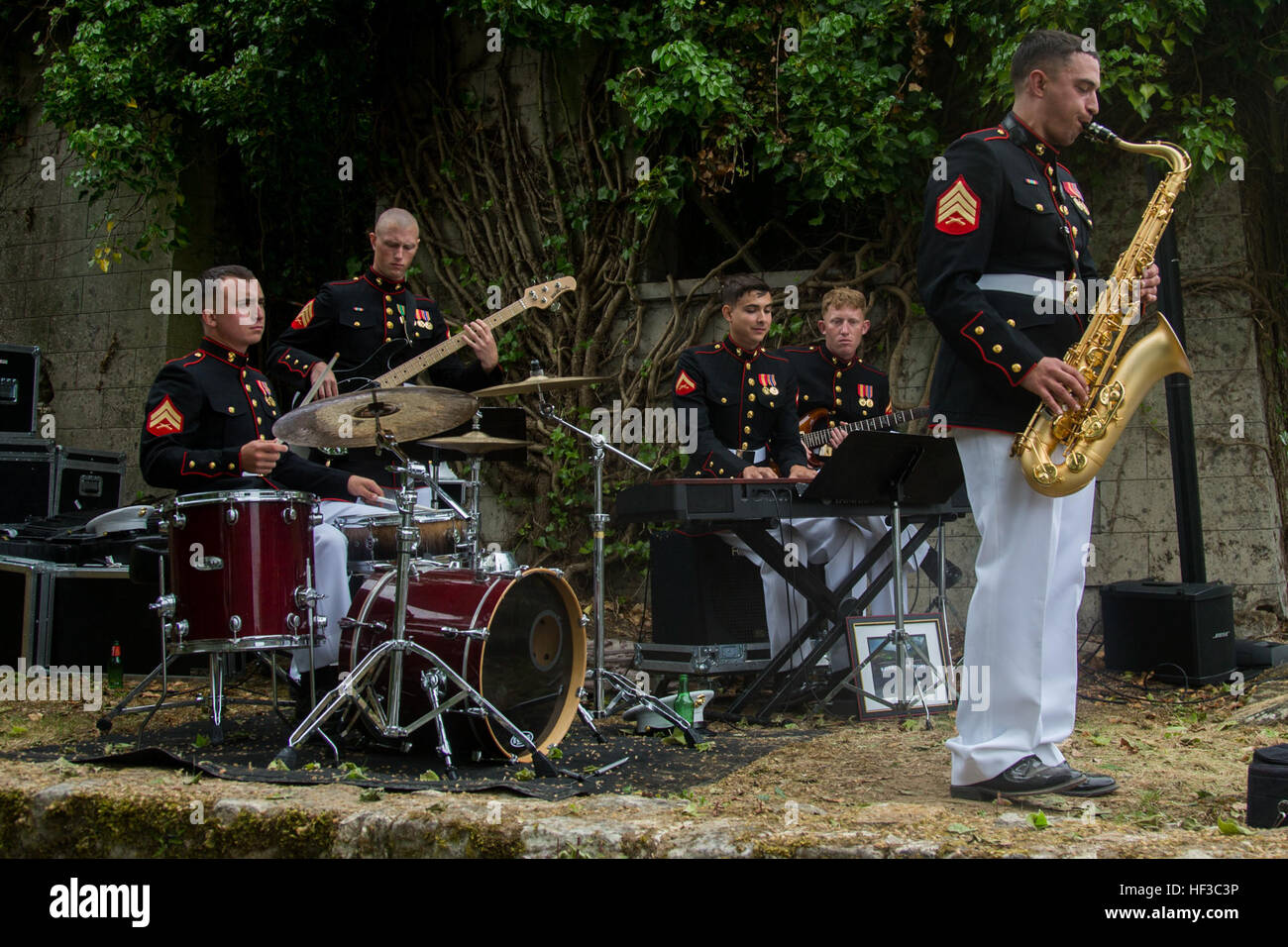 U.S. Marines with the 1st Marine Division Combo Band perform after an ...
