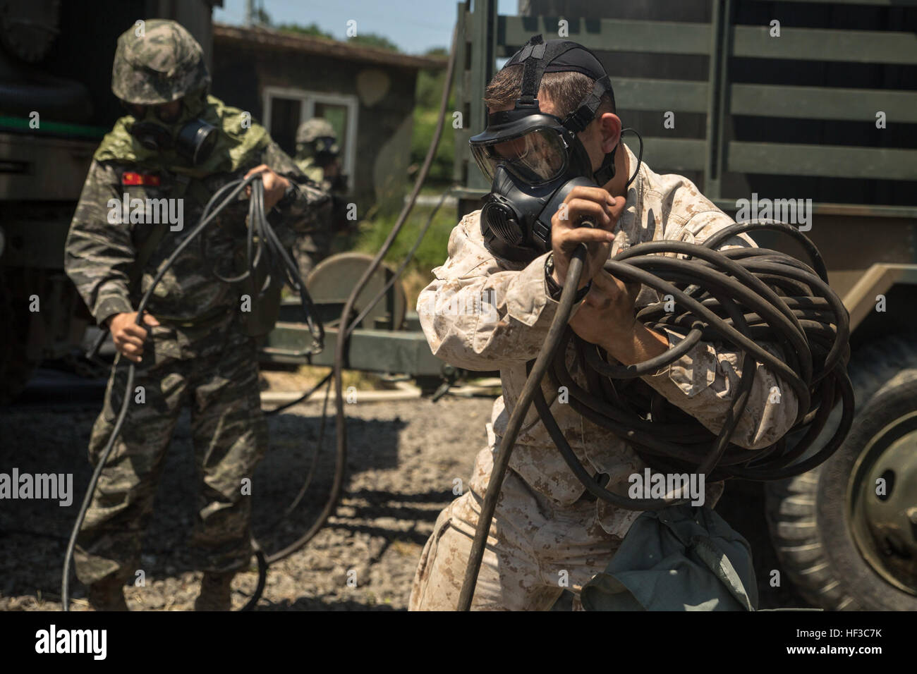 U.S. Marine Cpl. Avery T. McCormick works with Republic of Korea ...