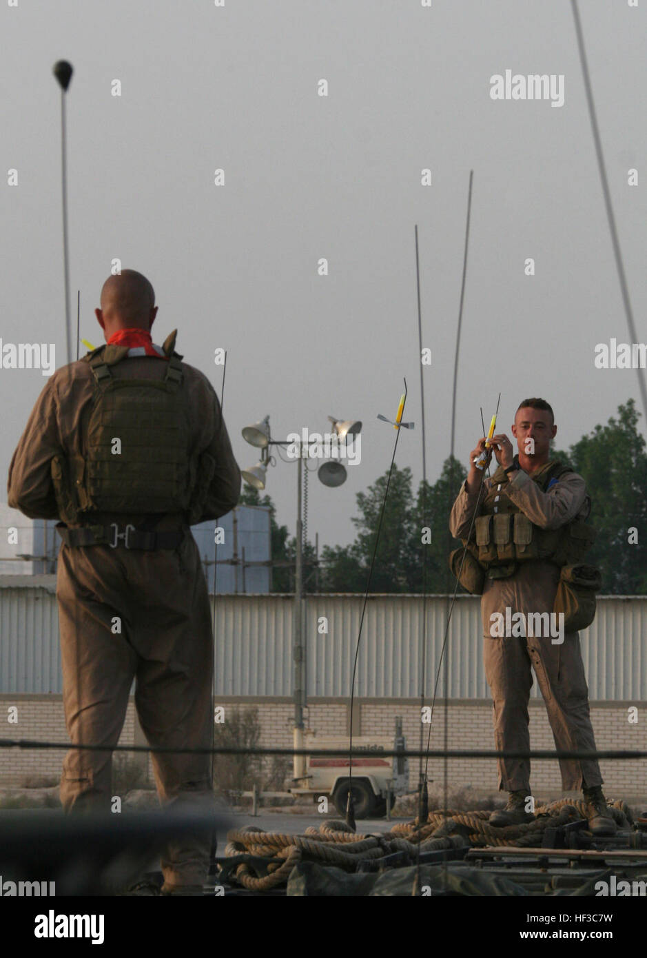 As the sun sets, Marines with Amphibious Assault Vehicle Platoon, India ...