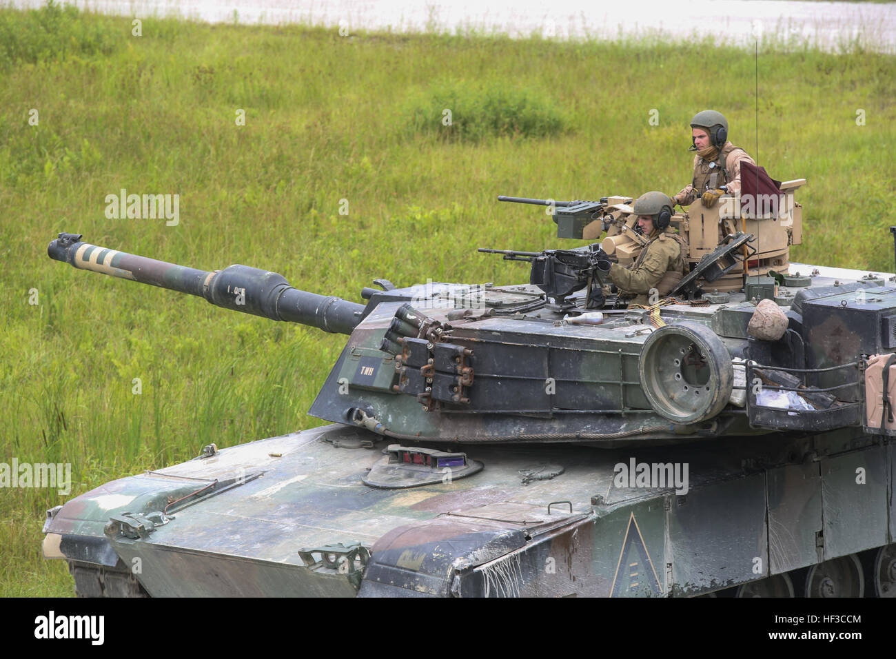 The tank gunner crew representing 2nd Tank Battalion prepares to fire ...