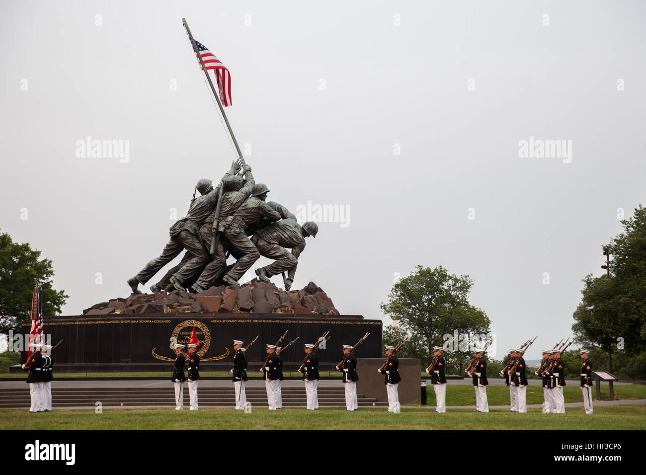 U.S. Marines prepare for the pass in review during the Sunset Parade at ...