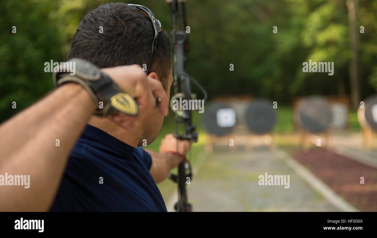 Staff Sgt. Jose Ramirez an infantry unit leader practices his bow ...