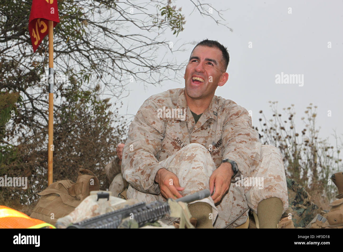 Capt. Edward Solis, the commanding officer of Company K takes a break ...
