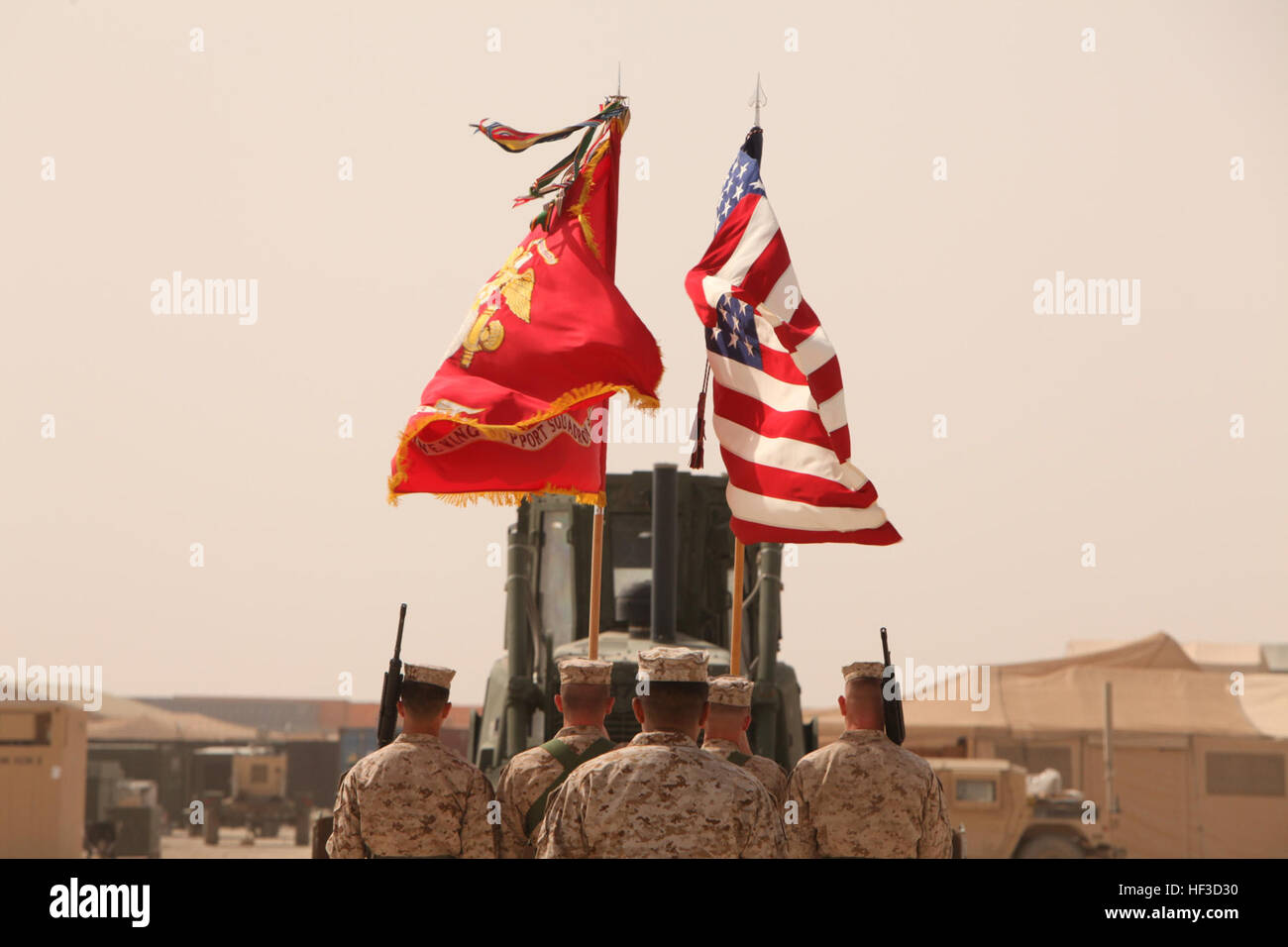 The MWSS-373 color guard marches with the American flag and squadron ...