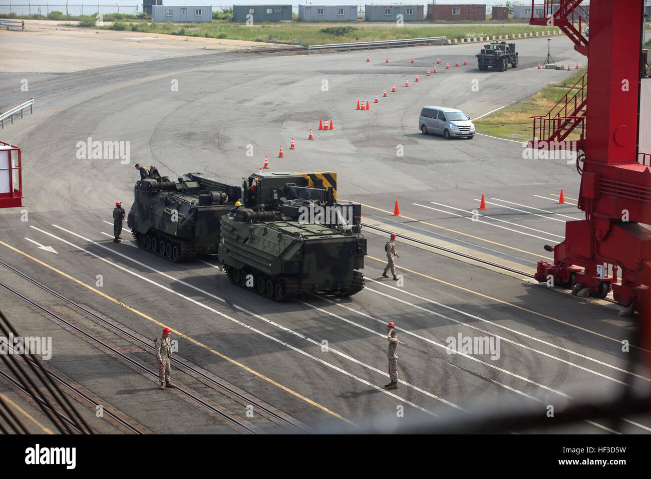 U.S. Marine Corps equipment is offloaded from the U.S. Naval Ship 2nd ...