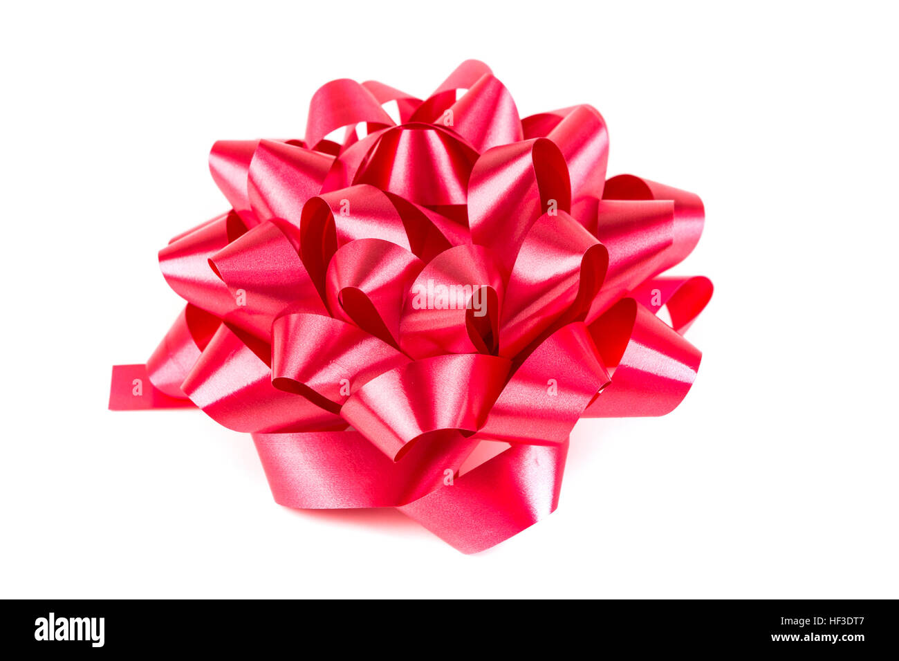 Bright red bow isolated on white background Stock Photo - Alamy