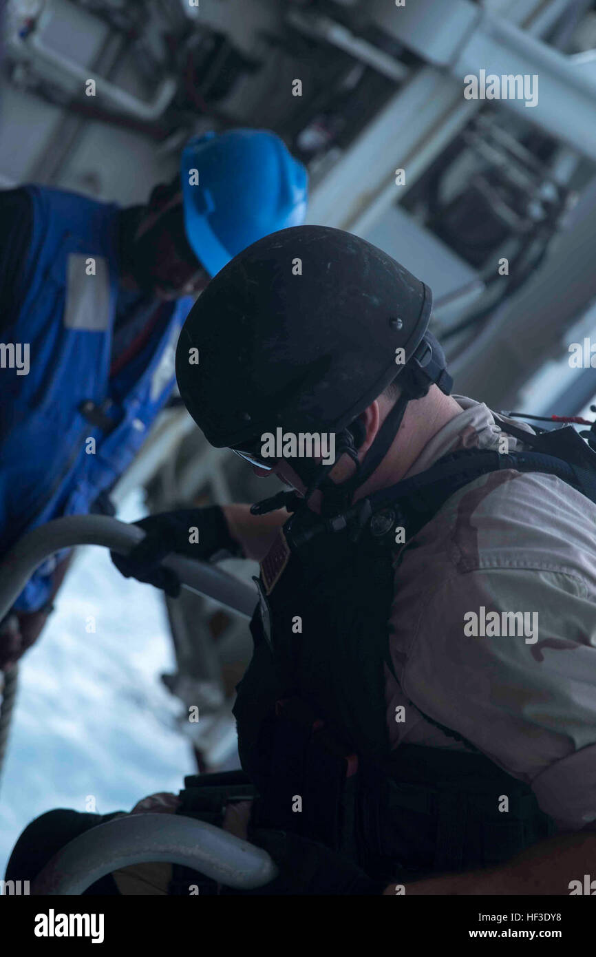 A U.S. Navy sailor attached to the visit board search and seizure (VBSS ...