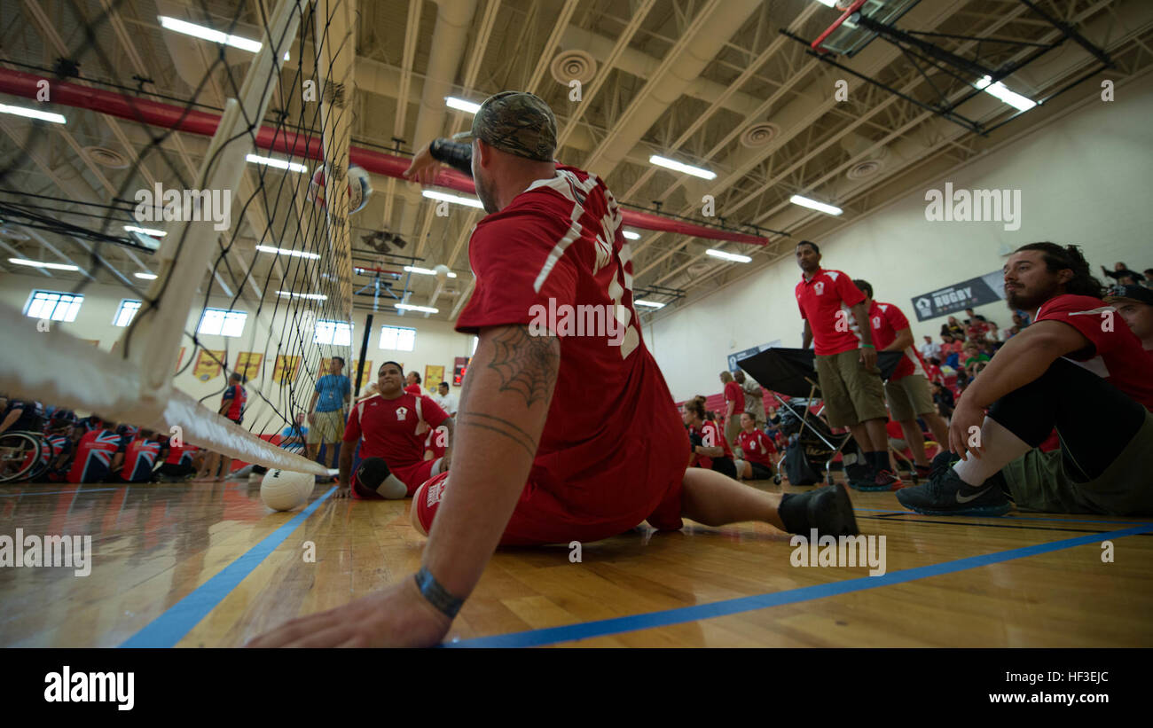 U.S. Marine Corps Matthew Roach practices his spike during drills ...