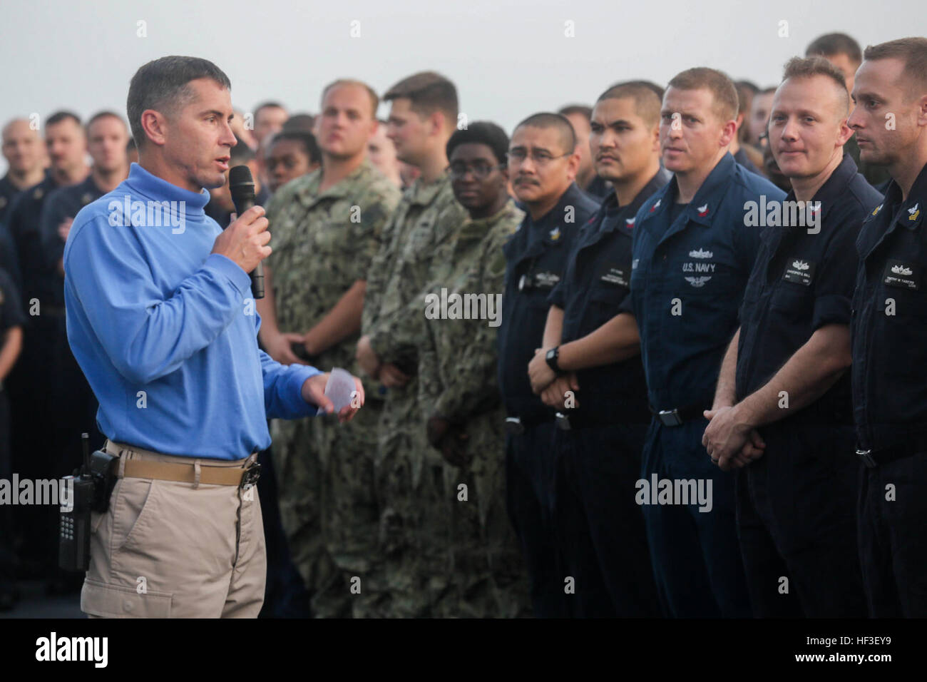 The commanding officer of USS Anchorage addresses sailors on the ...