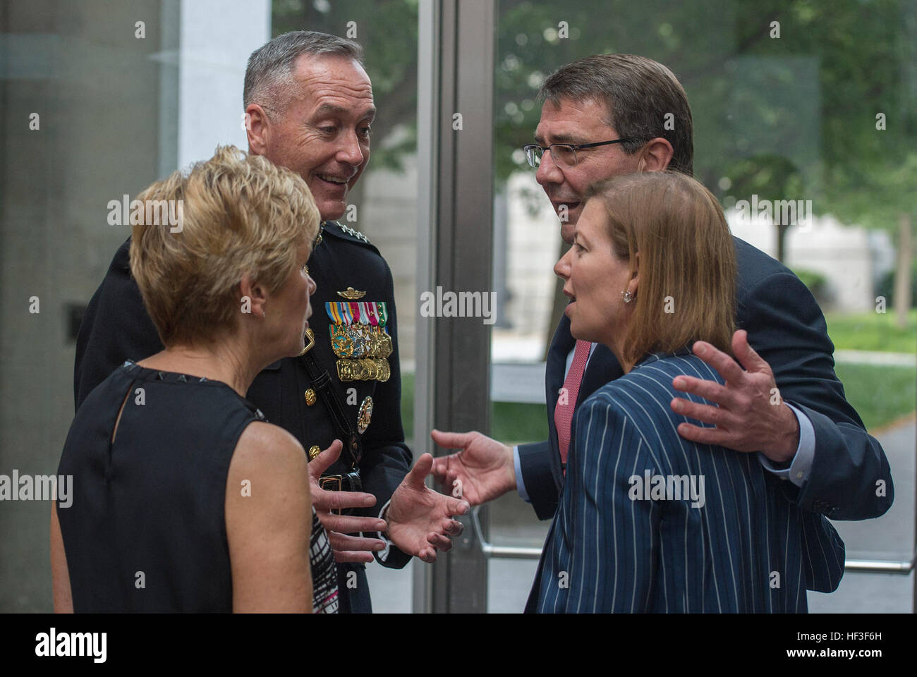 Secretary of Defense Ash Carter and his wife Stephanie speak with ...
