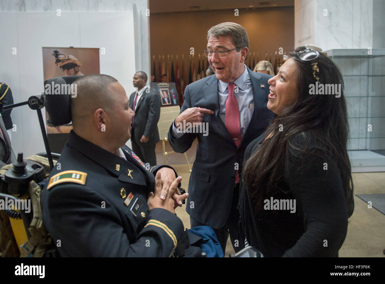 Secretary of Defense Ash Carter speaks with Capt. Luis Avila as he ...