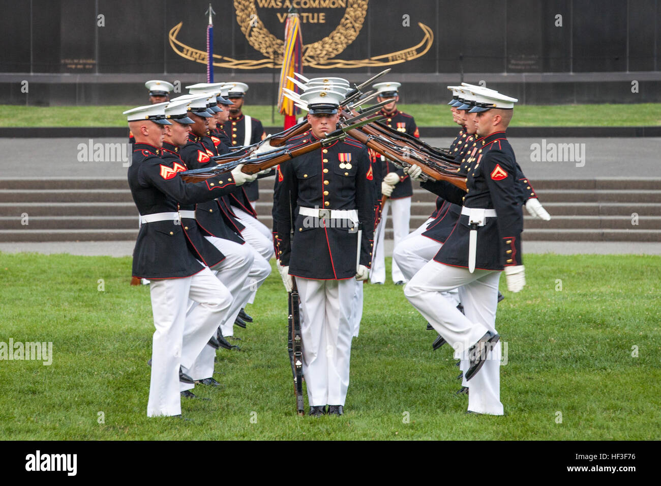 The U.S. Marine Corps Silent Drill Platoon performs during the sunset ...