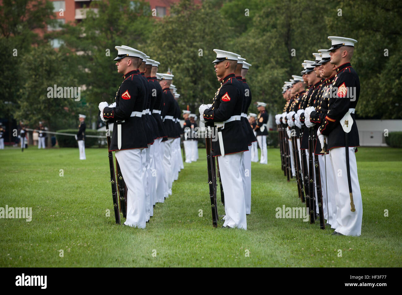 U.S. Marines with Marine Barracks Washington stand in formation during ...