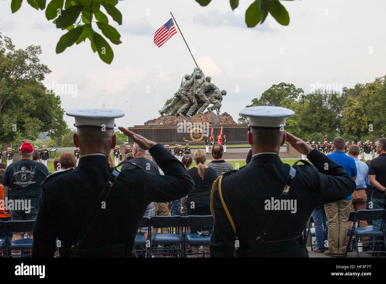 U.S. Marines with Marine Barracks Washington salute the colors during a ...