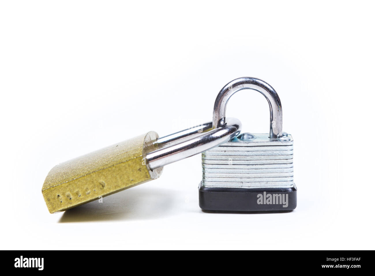 Two multicolored padlocks isolated on white background Stock Photo - Alamy